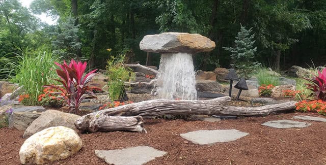 Pond Construction | Pondless Feature with Bizarre Boulder Formation ...