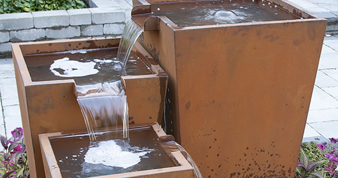 Rusted Steel Fountain Takes You Back in Time - POND Trade Magazine